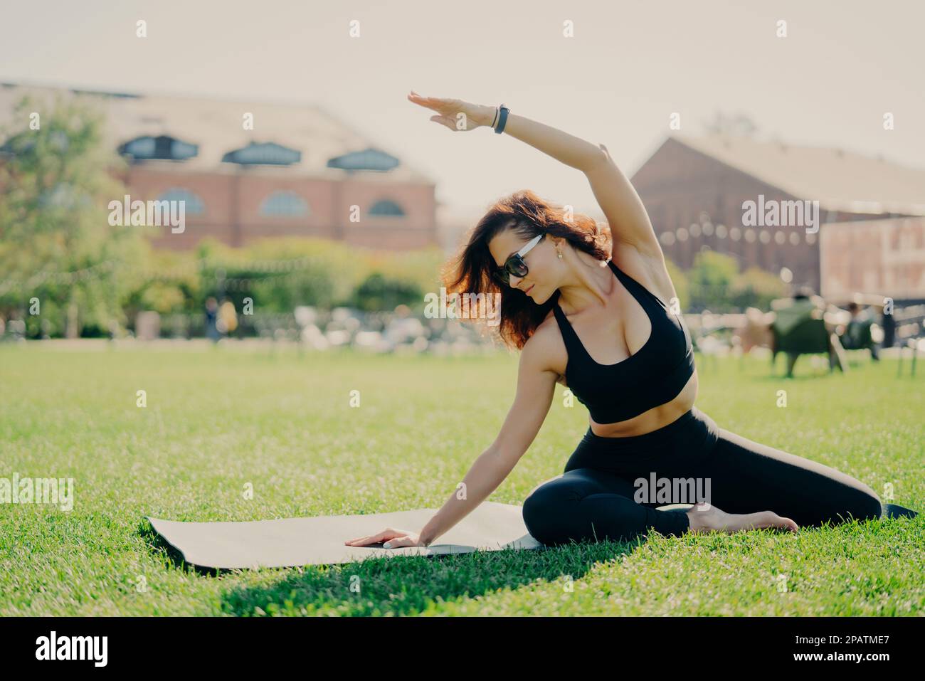 Horizontal shot of motivated young female model has regular morning ...
