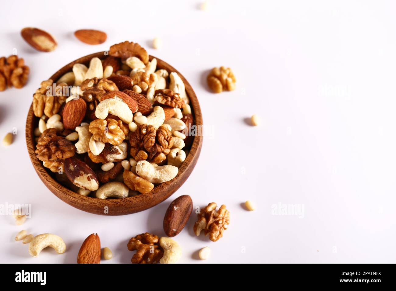 natural assorted nuts on white background Stock Photo - Alamy