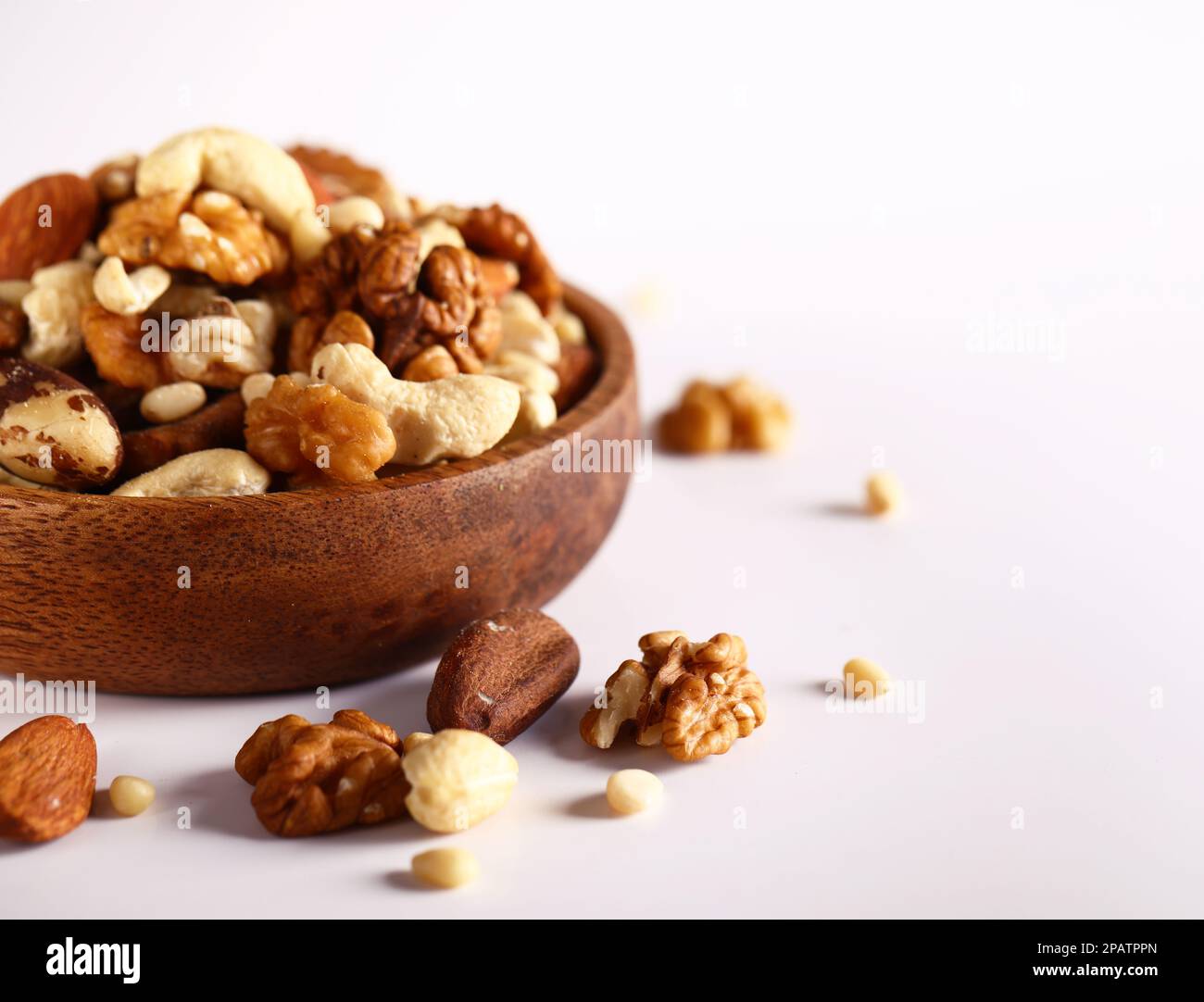 natural assorted nuts on white background Stock Photo - Alamy