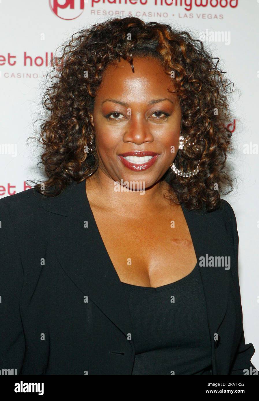 Regina Taylor arrives at the grand opening of the Planet Hollywood ...