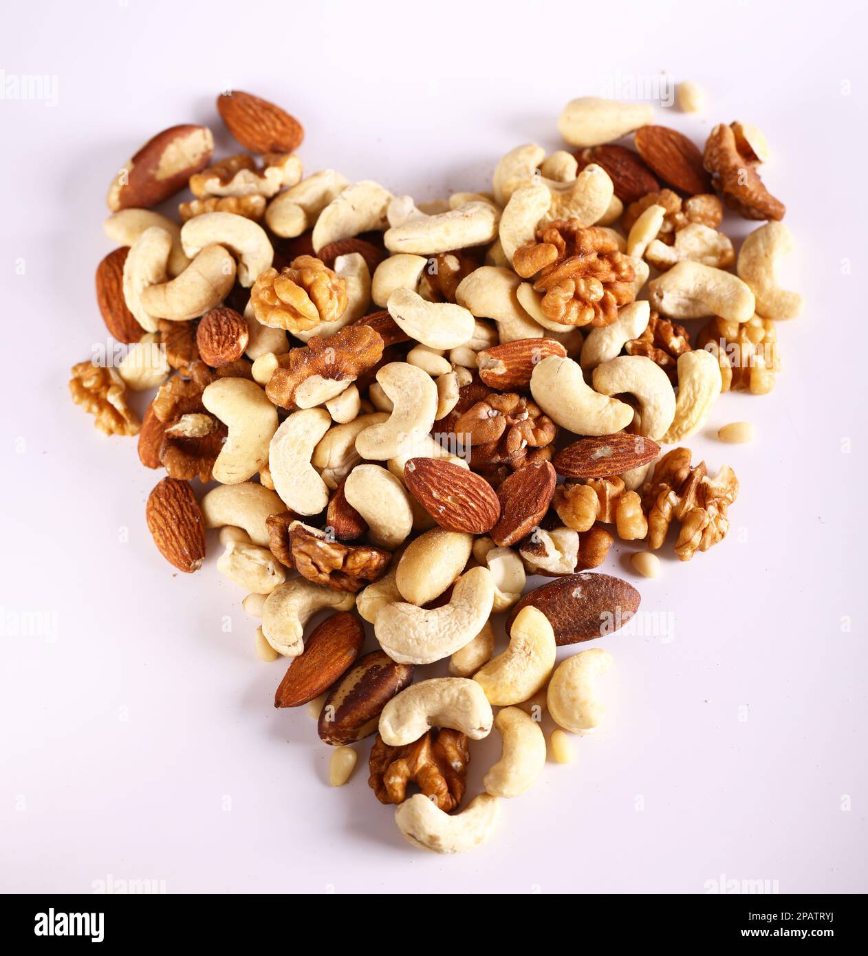 natural assorted nuts on white background Stock Photo - Alamy