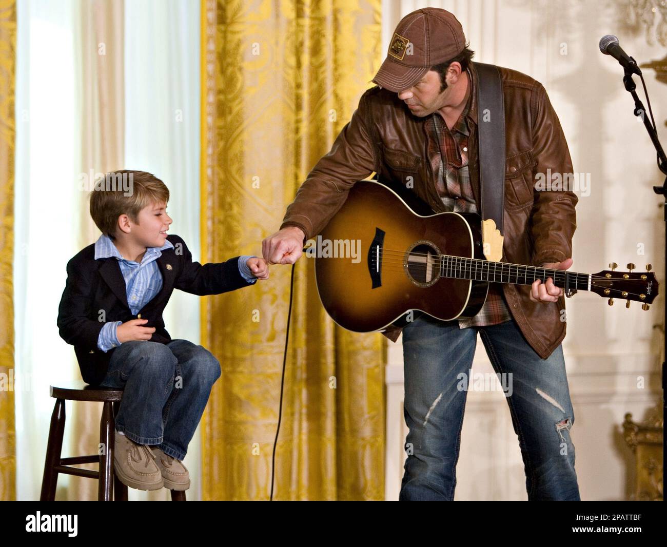 Country music artist Rodney Atkins, right, and his son Elijah, left ...