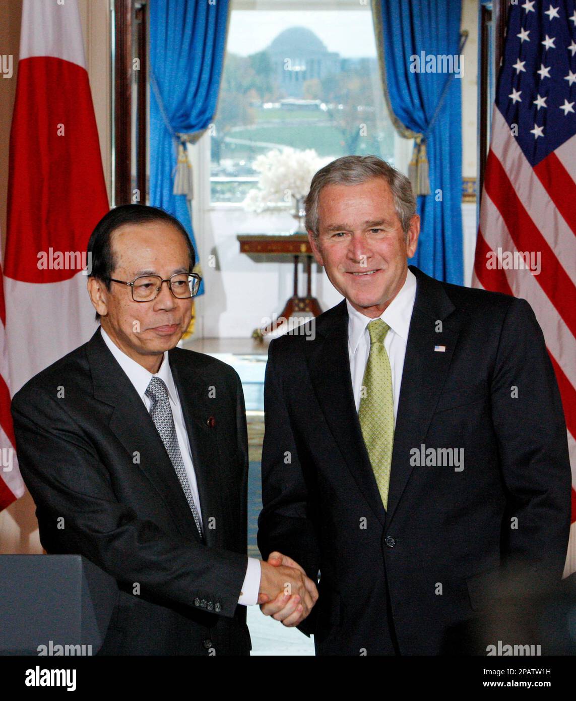 President Bush, right, shakes hands with Japanese Prime Minister Yasuo ...