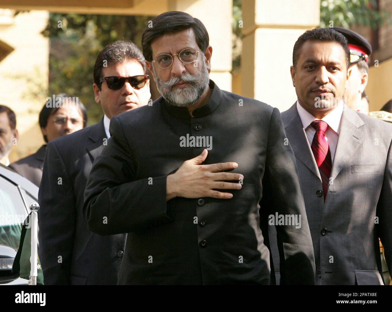 Pakistan's newly appointed Prime Minister Mohammedmian Soomro, center ...