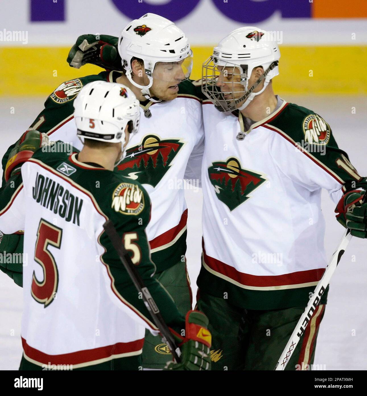 Minnesota Wild's Kim Johnsson, left, of Sweden, and Martin Skoula, of ...
