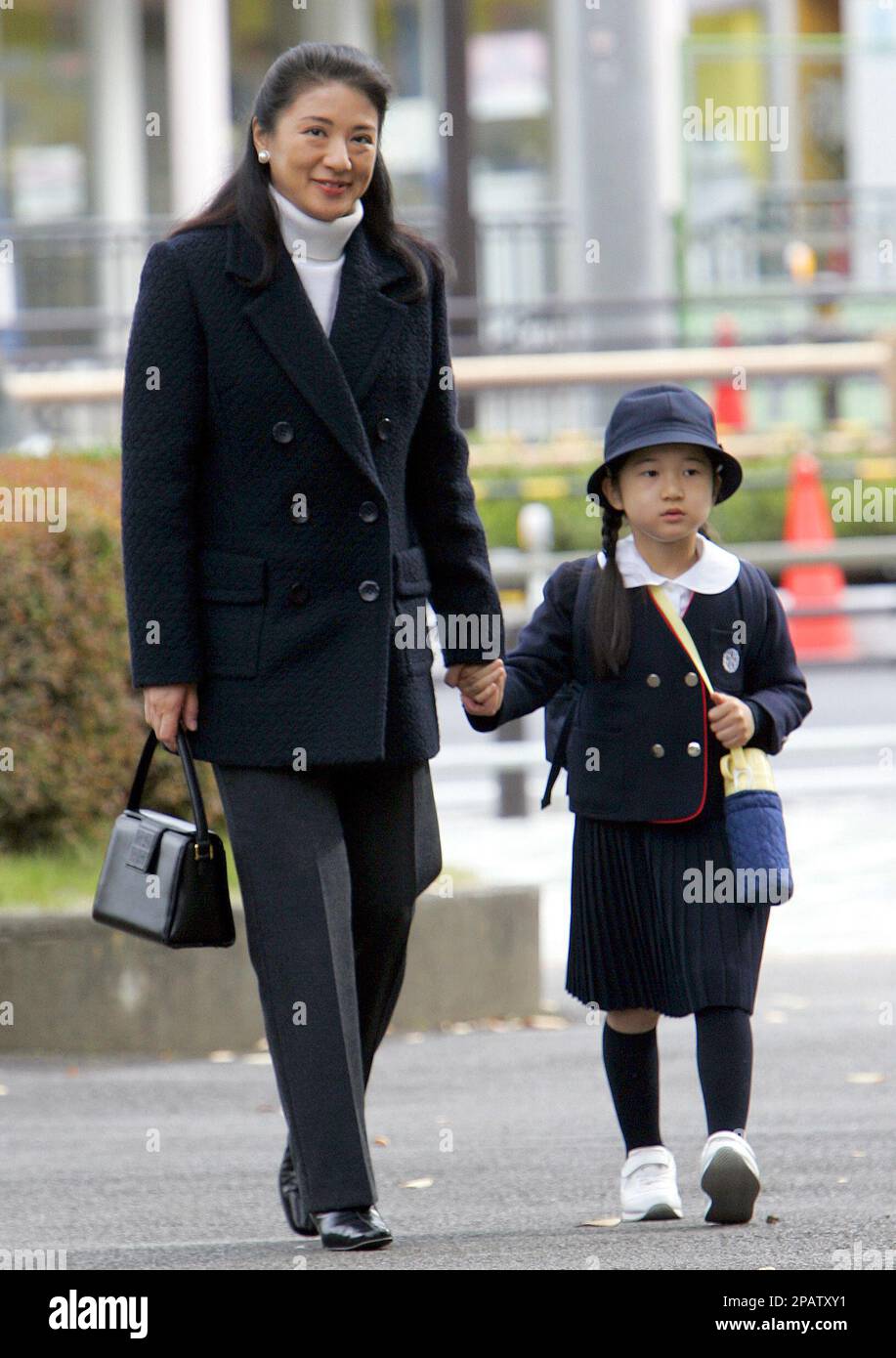 Japan's Crown Princess Masako, left, and her daughter and princess Aiko ...