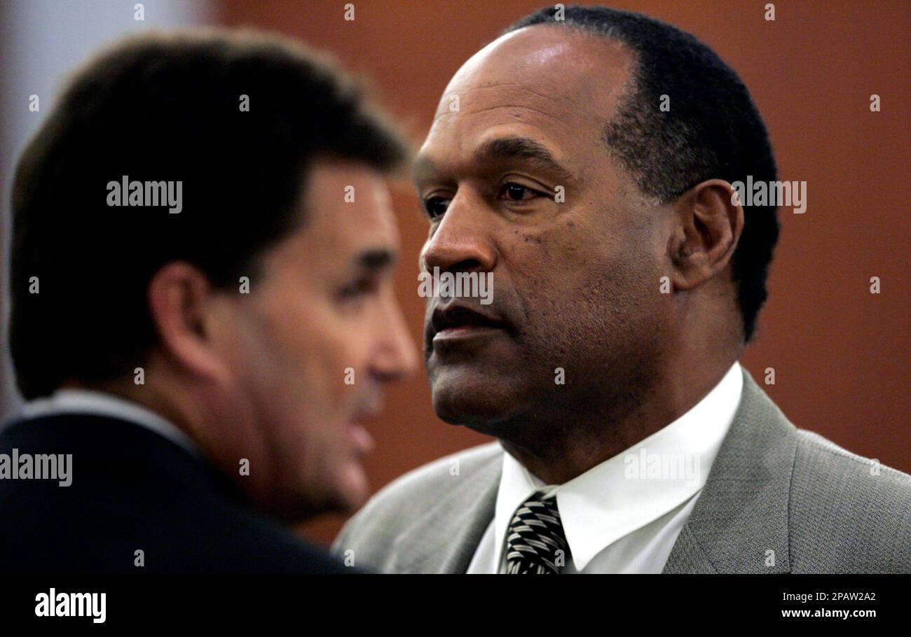O.J. Simpson, right, and his lawyer Yale Galanter appear in a courtroom ...