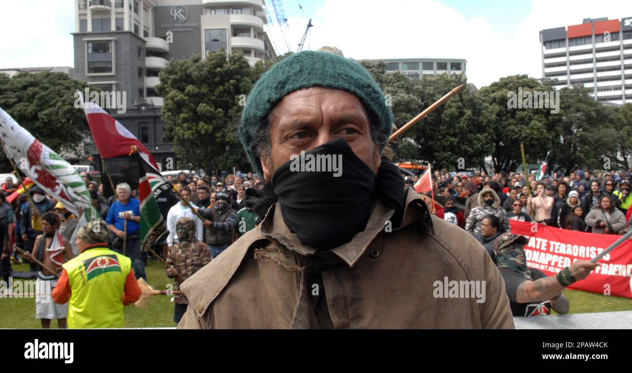 A member of the Tuhoe Maori tribe protests against the recent arrests ...