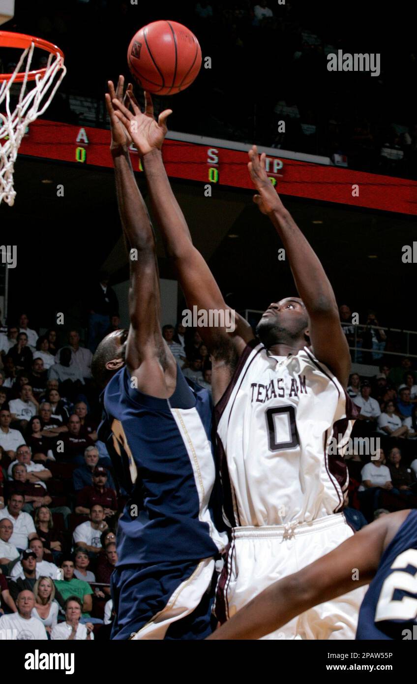 Texas A&M's Bryan Davis (0) and Oral Roberts' Shawn King, Bequia, of St ...