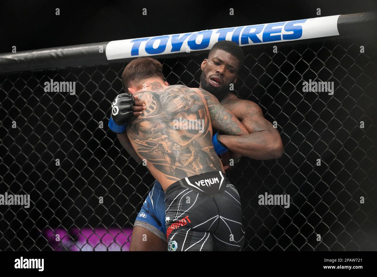 LAS VEGAS, NV - MARCH 4: (L-R) Cody Garbrandt controls the body of ...