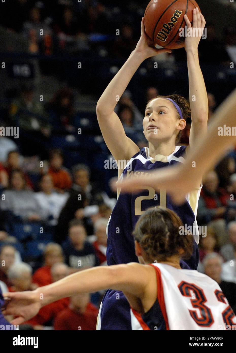 Washington's Katelan Redmon goes up and over Gonzaga's Jami Bjorklund ...