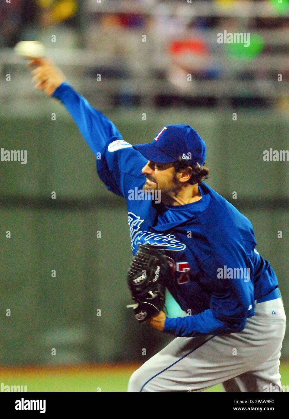 The Italy's Fiore Anthony James pitches against Taiwan in the 7th ...