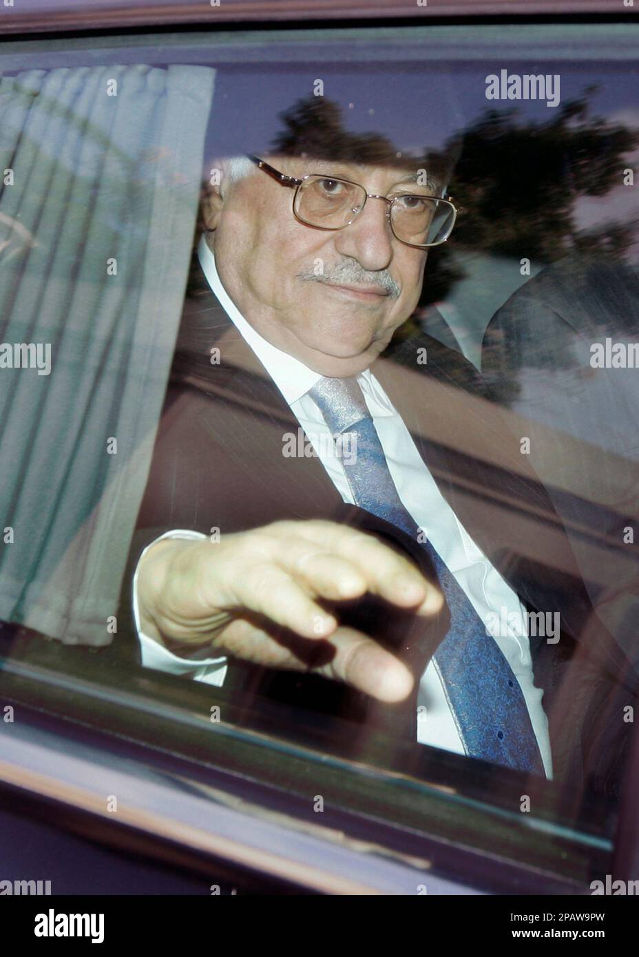 Palestinian President Mahmoud Abbas is seen leaving in a vehicle after ...