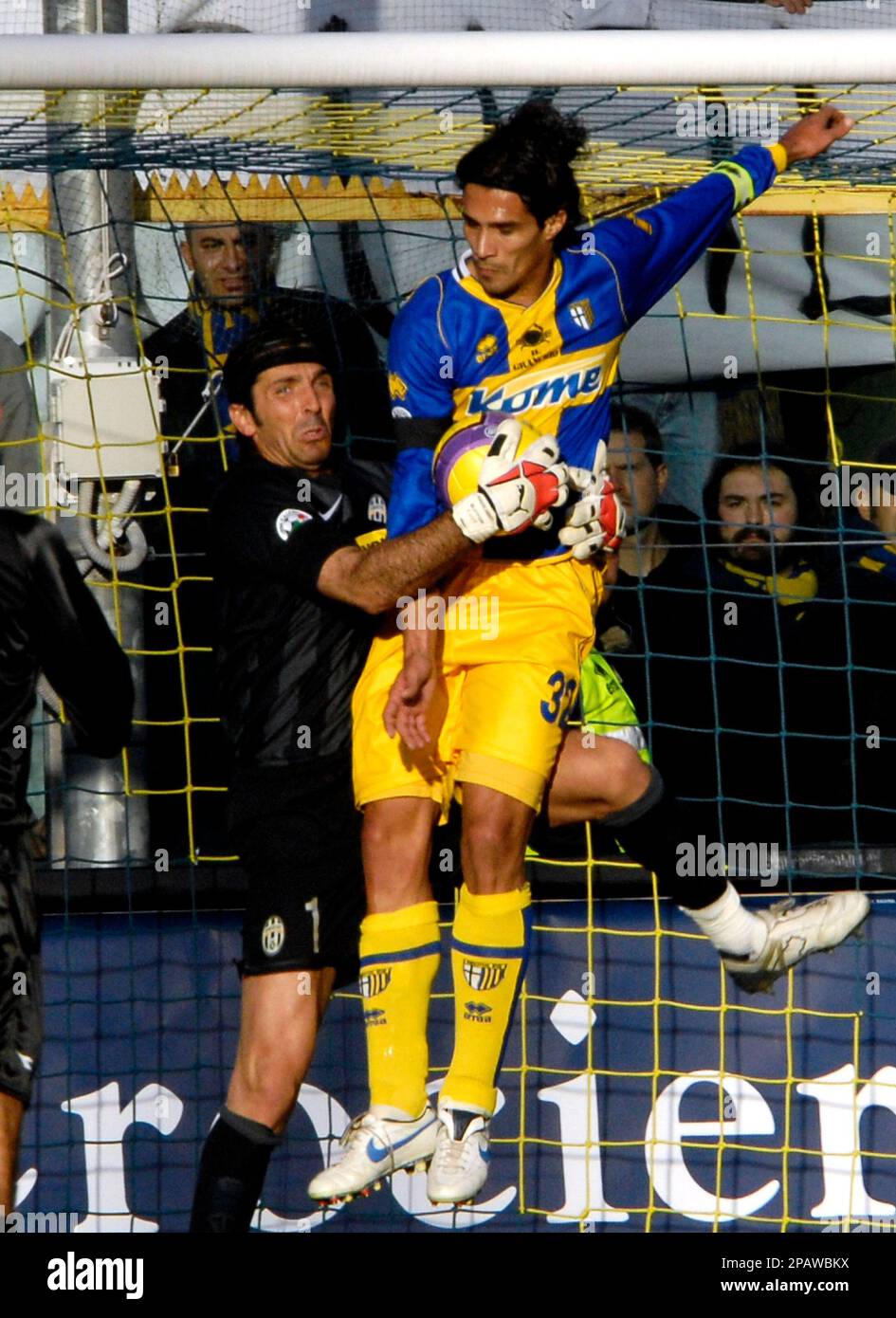 Juventus' goalkeeper Gianluigi Buffon saves on Parma's Bernardo Corradi ...
