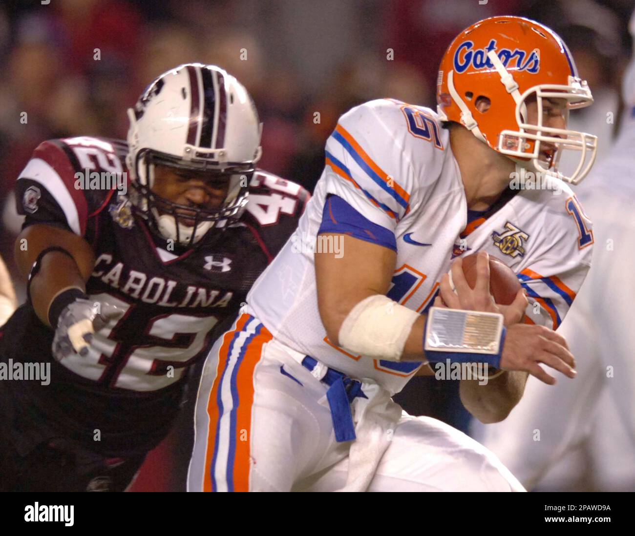 Florida's Tim Tebow (15) runs in for a touchdown as South Carolina's ...