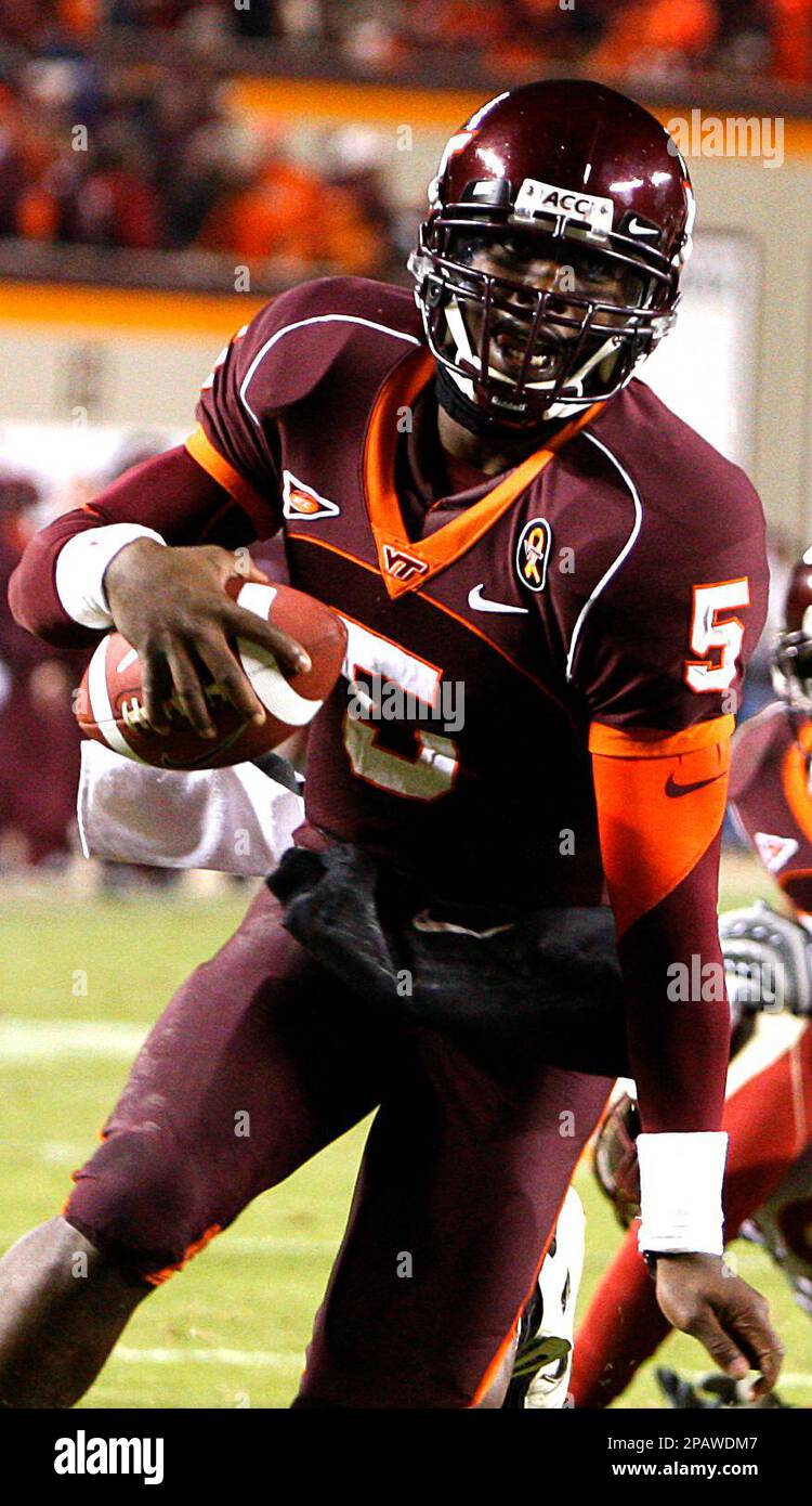 Virginia Tech quarterback Tyrod Taylor breaks for a touchdown in the ...