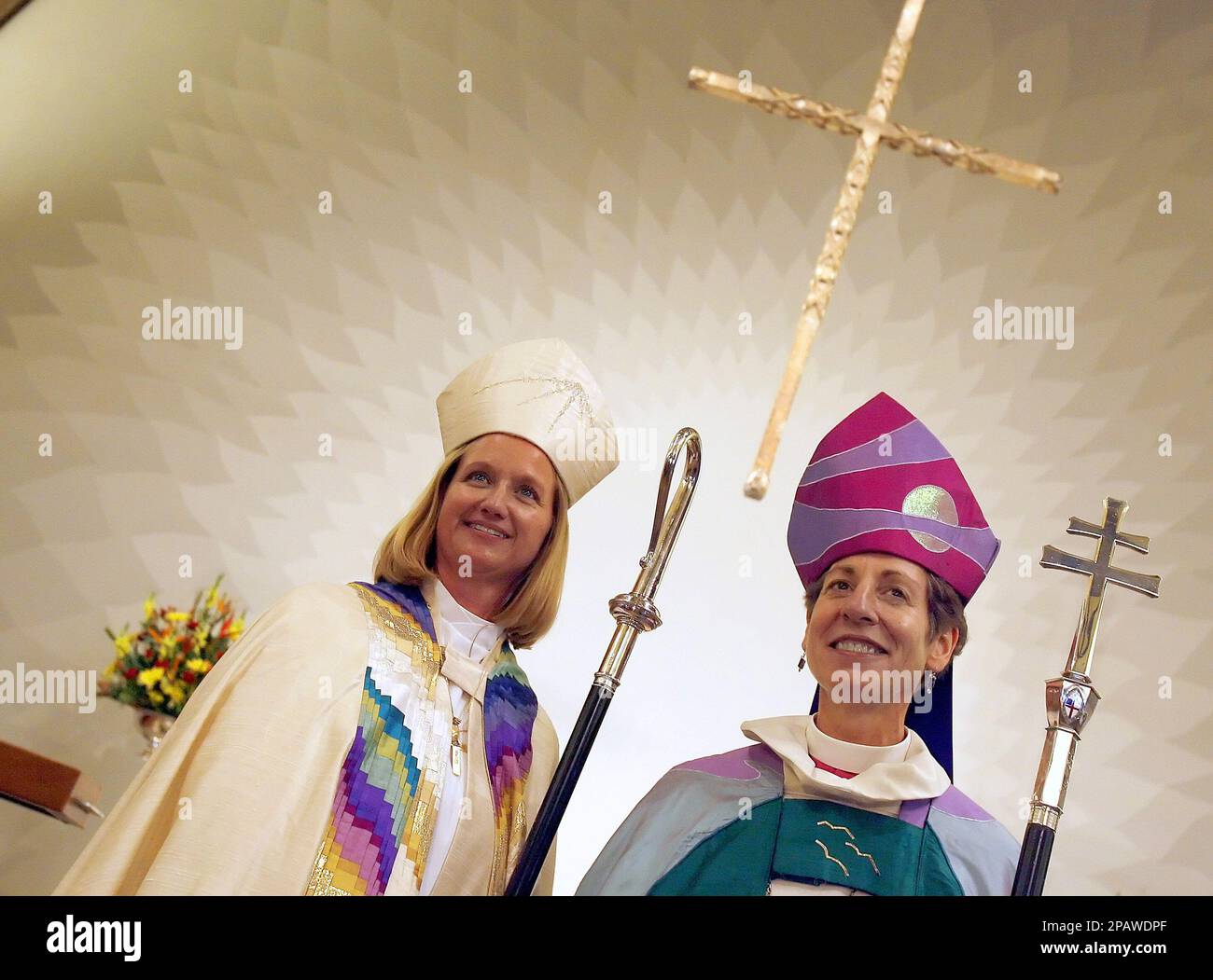 Rev. Mary Gray-Reeves, left, newly ordained bishop of the Episcopal ...