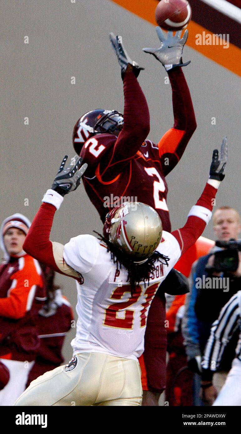 Virginia Tech split end Josh Morgan goes up for a catch against Florida ...