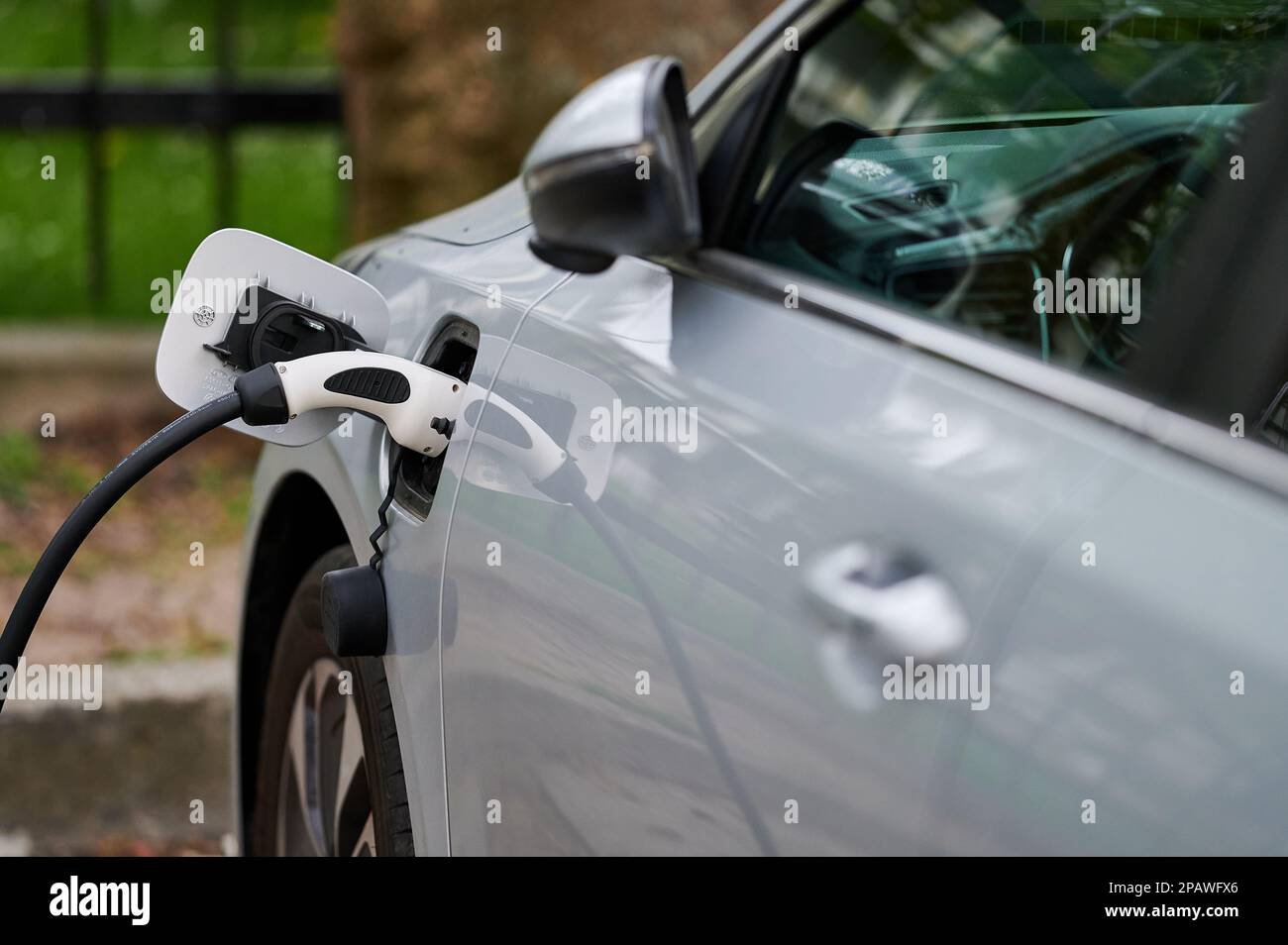 Electric charging cable connected hi-res stock photography and images ...