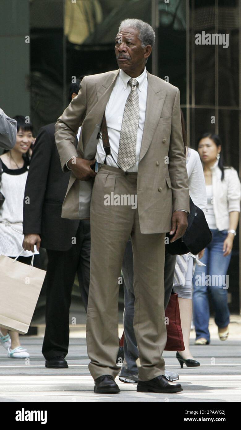 Actor Morgan Freeman gestures during the filming of his latest Batman ...