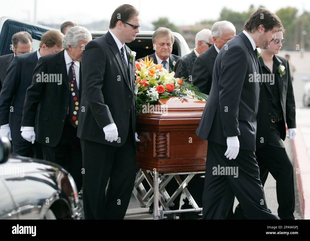 Pallbearers carry Robert Goulet's casket to The Shrine of the Most Holy ...