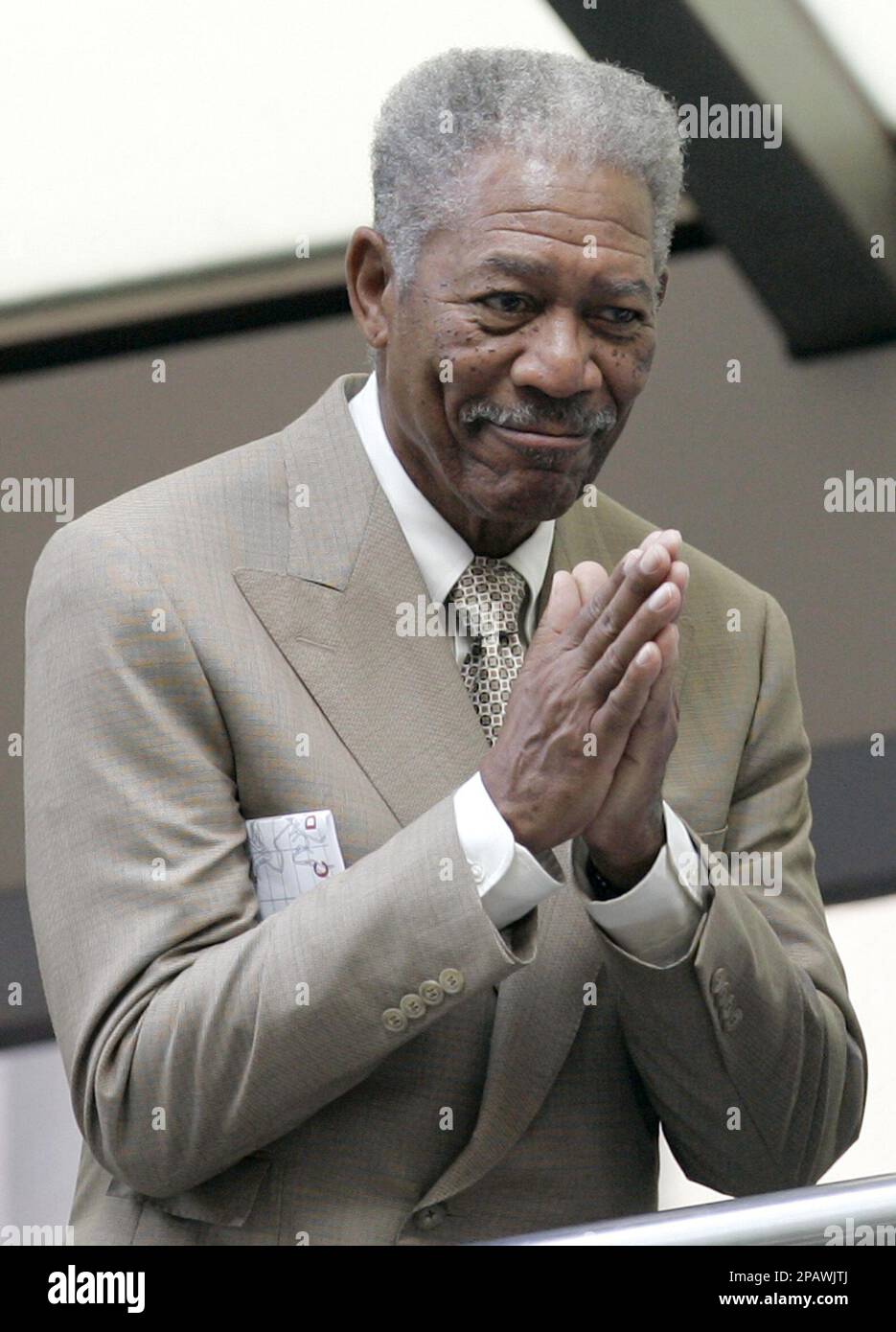 Actor Morgan Freeman gestures while filming a scene for the latest ...