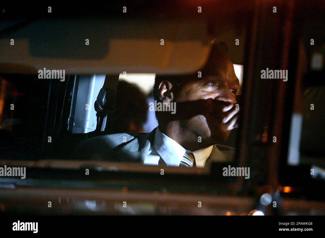 O.J. Simpson looks out the window as he leaves the Clark County Justice ...