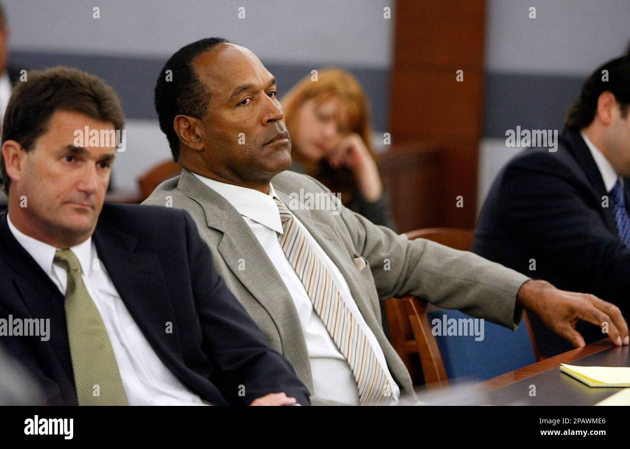 O.J. Simpson, right, and his lawyer Yale Galanter sit in a courtroom ...