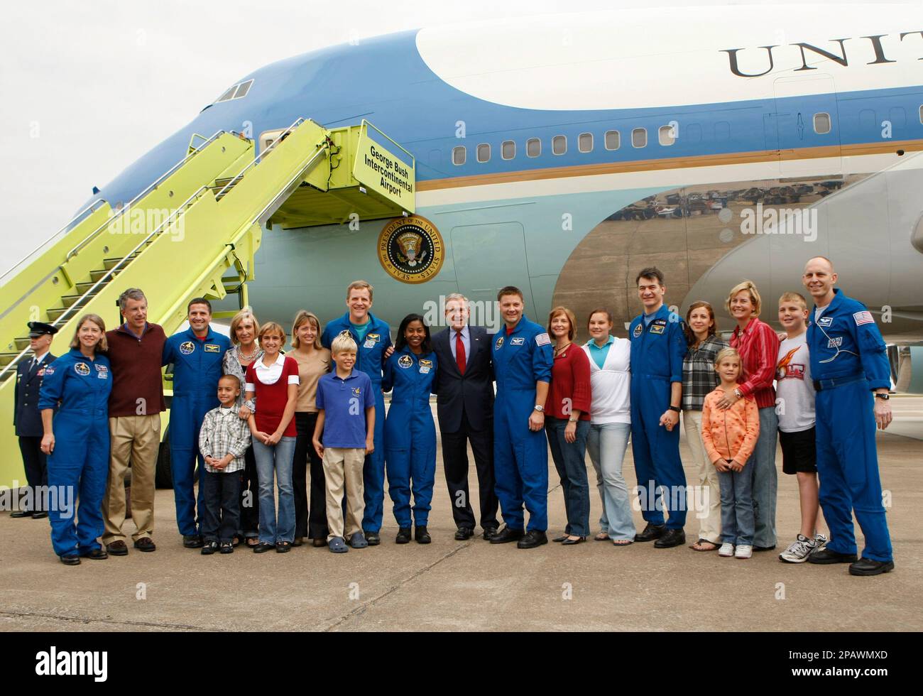President Bush, center, poses or a photo with the seven Space Shuttle ...