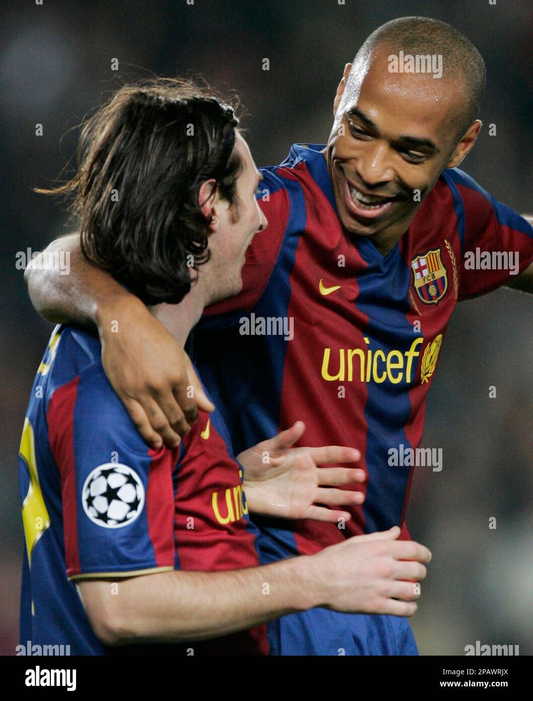 FC Barcelona's Leo Messi of Argentina, left, celebrates with Thierry ...