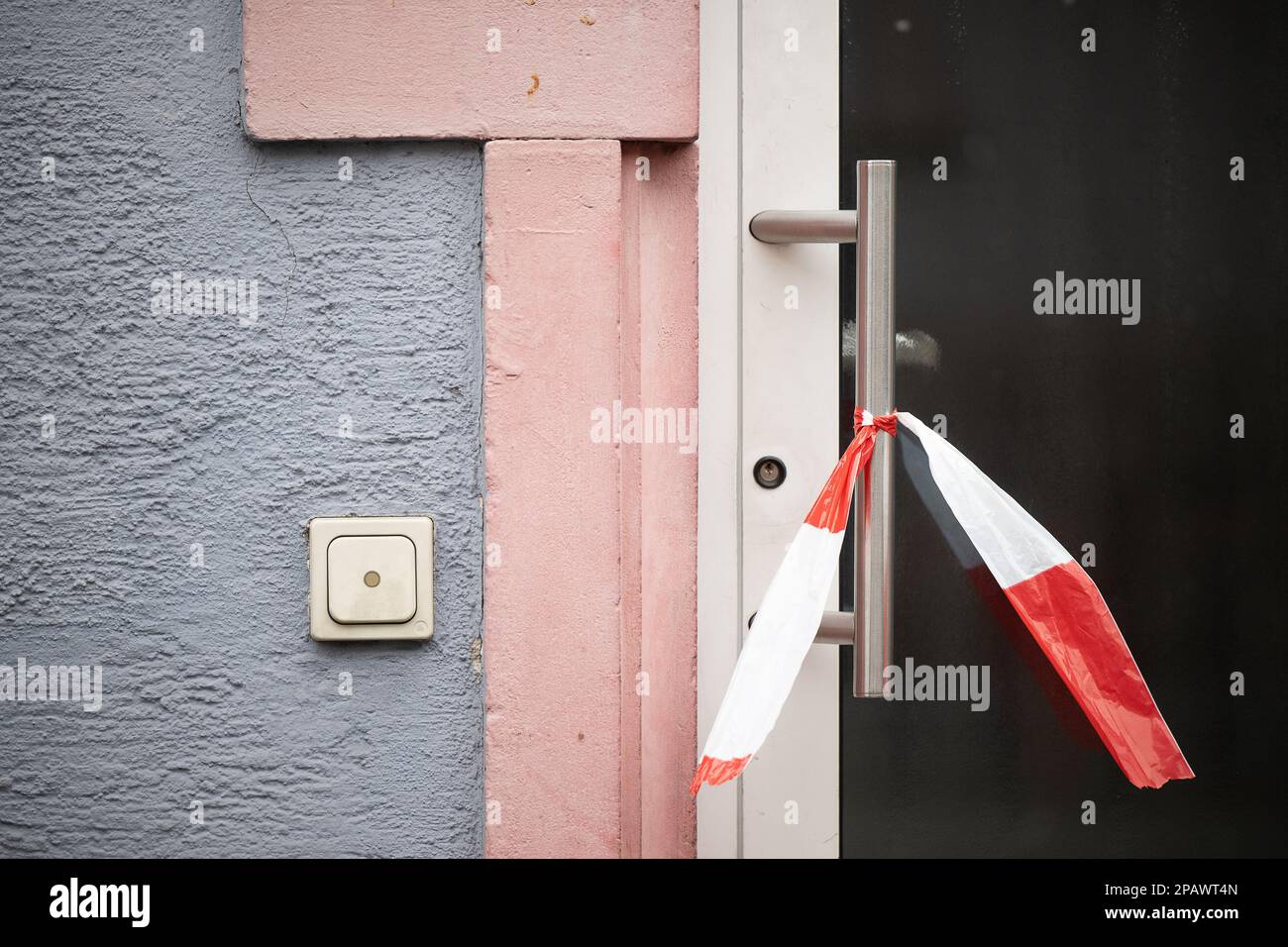 Hanau, Germany. 12th Mar, 2023. A tape marks a house in the evacuation ...