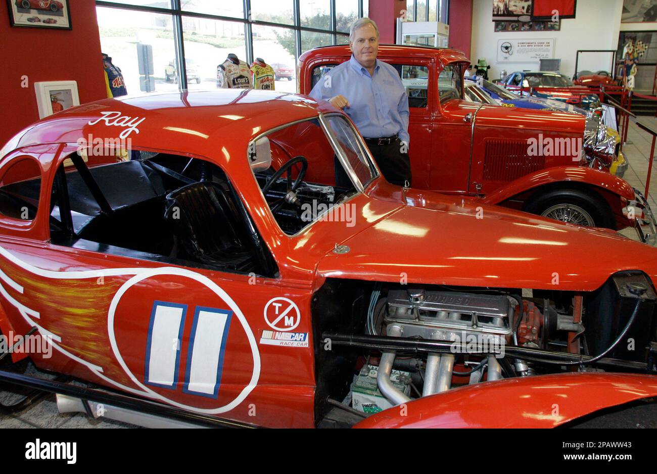 NASCAR team owner Rick Hendrick poses with the team's first race car ...