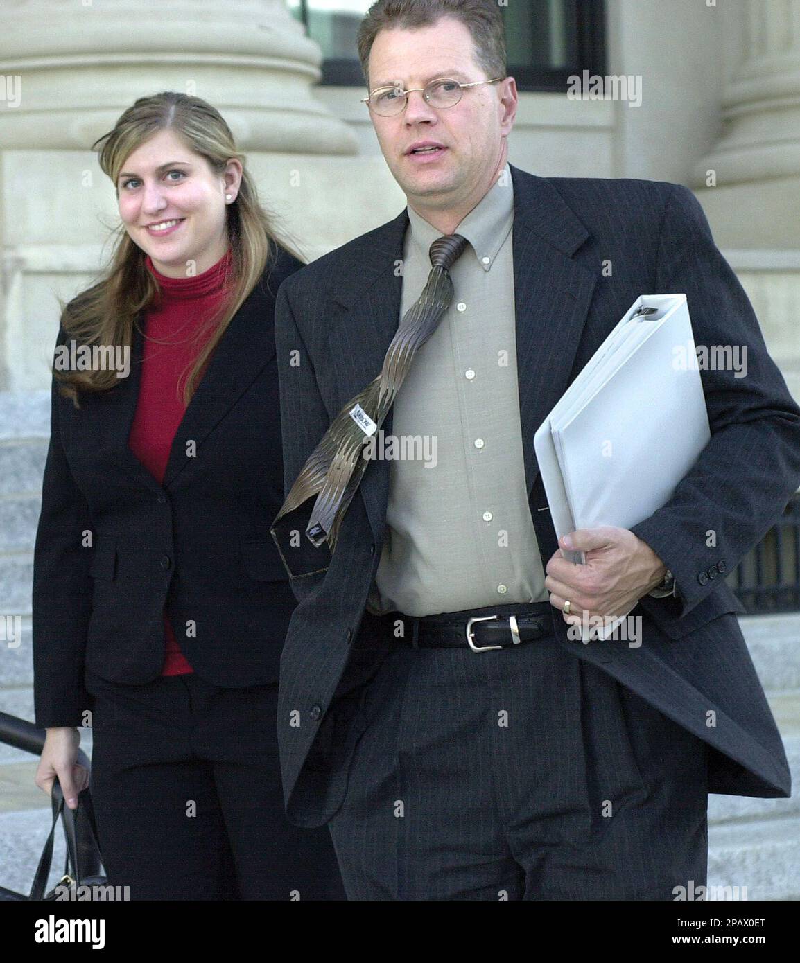 Dr. Robert Denney, right, conduct a mental evaluation in September of ...