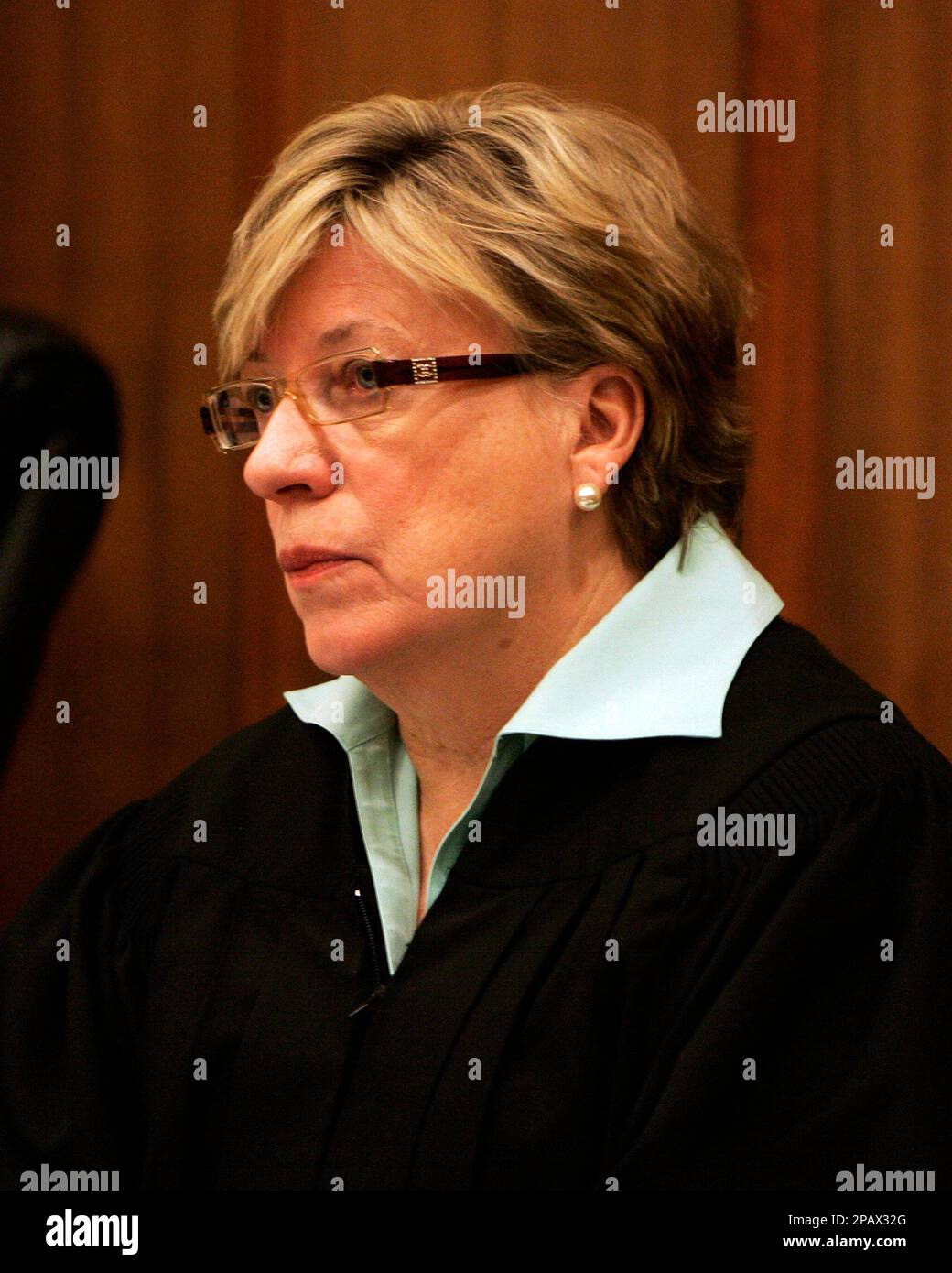 District Court Judge Patricia Curtin presides over the arraignment of ...