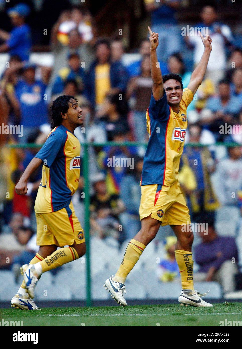America's Enrique Esqueda, right, and Juan Mosqueda celebrate after Esqueda scored a goal ...