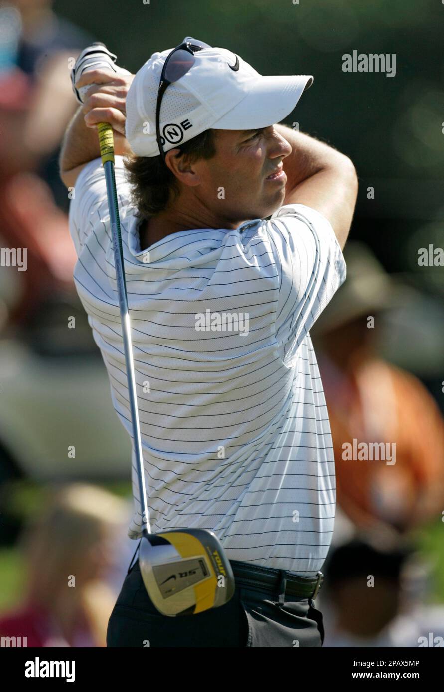 Stephen Ames, of Canada, hits a shot from the second tee during the ...