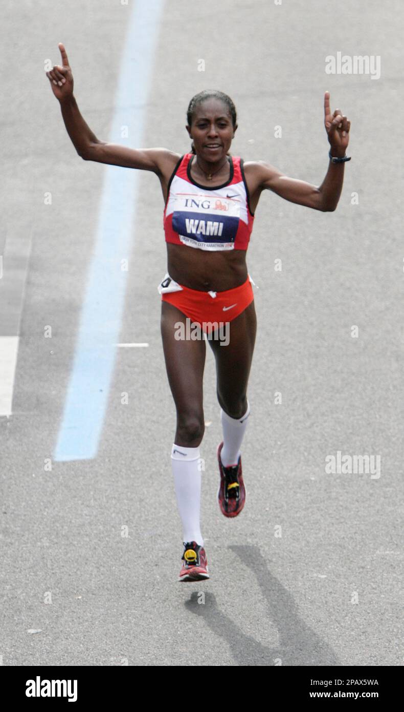 Gete Wami, of Ethiopia, places second in the women's division at the ...