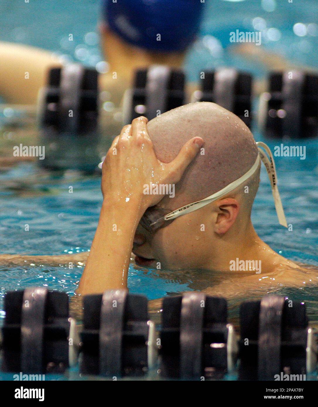 North Pole's Bryce Peck reacts to his third-place finish in the men's ...