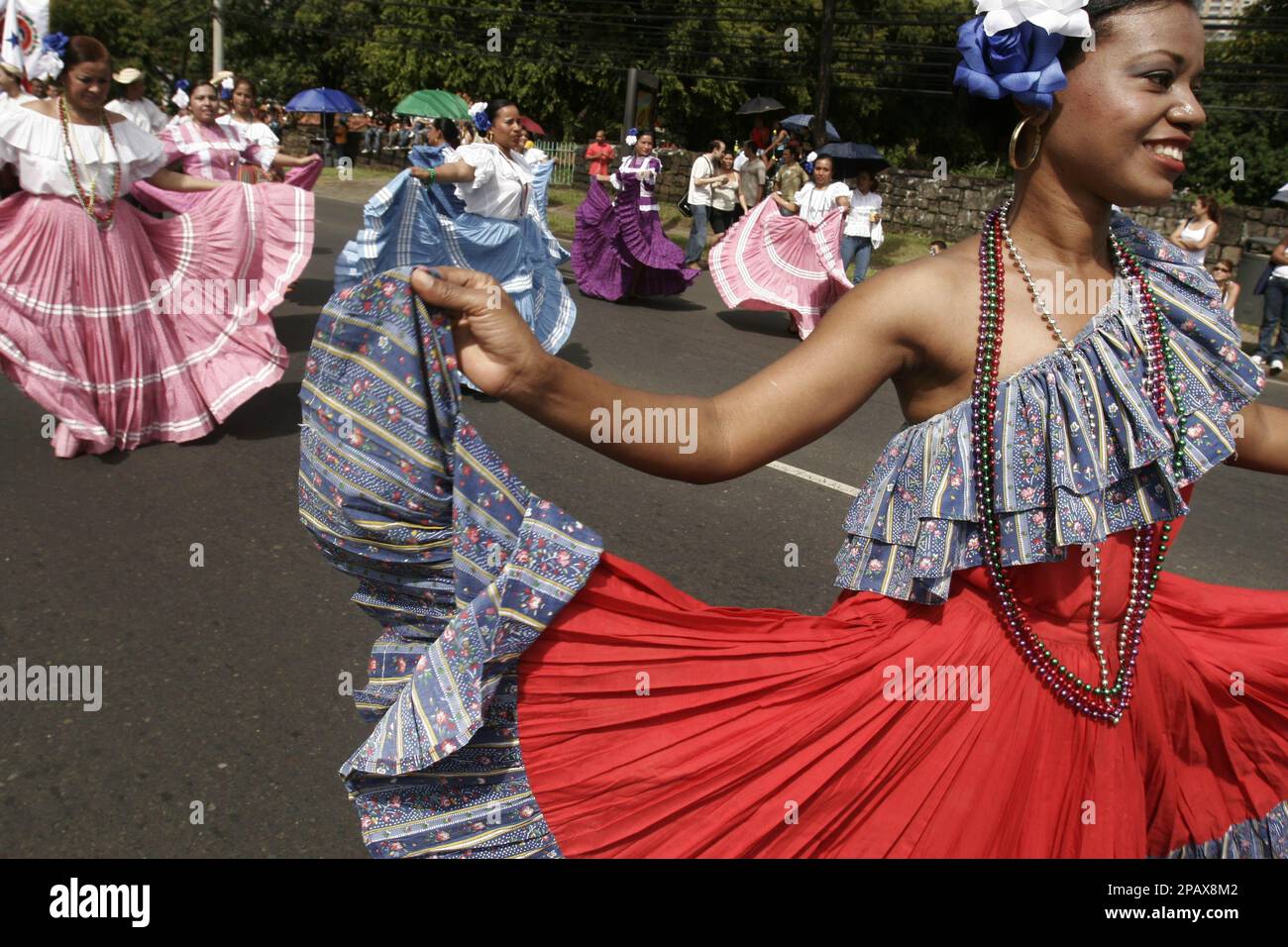 High school students wearing traditional customs parade during ...
