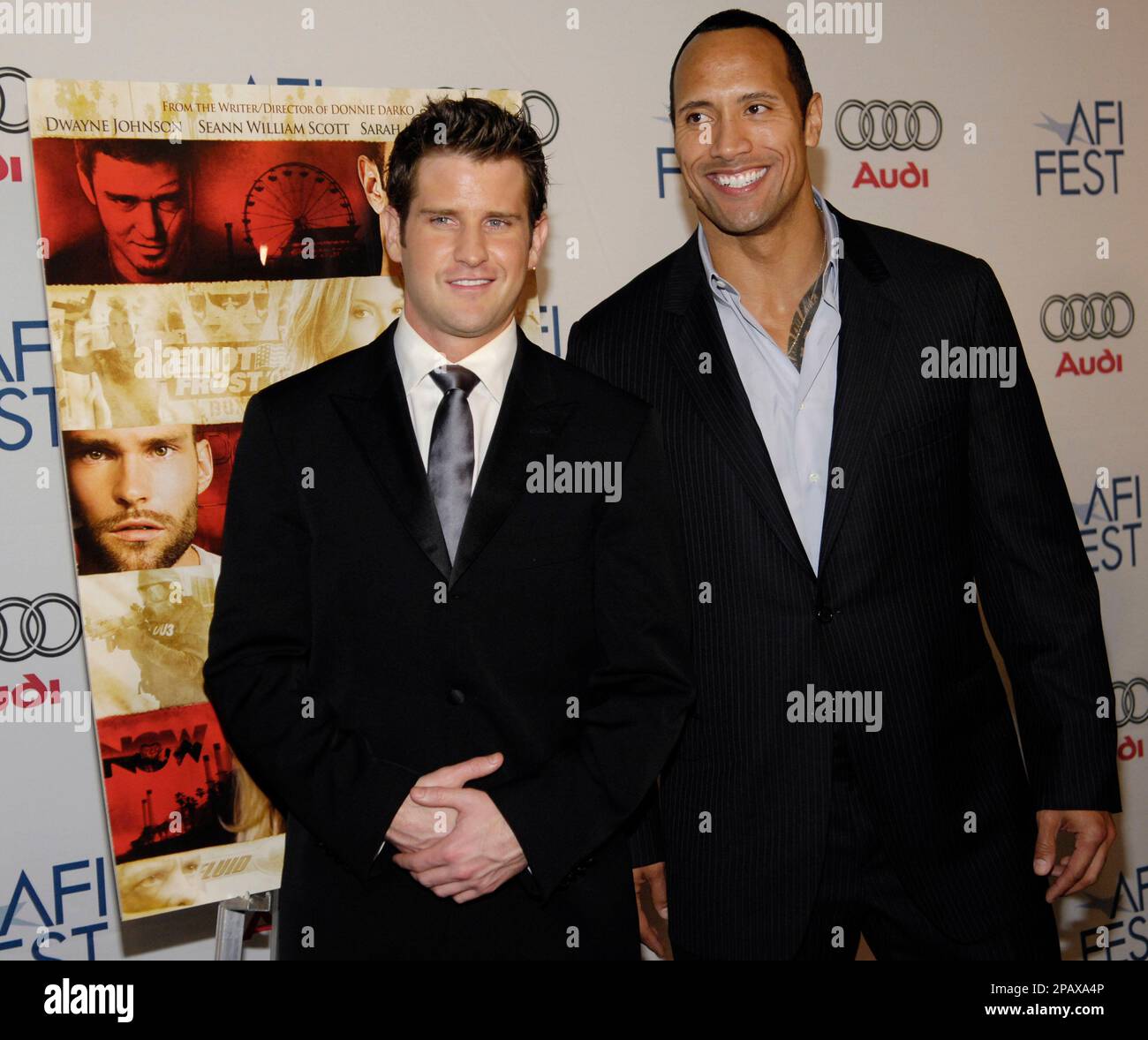 Director Richard Kelly, left, poses with cast member Dwayne "The Rock ...
