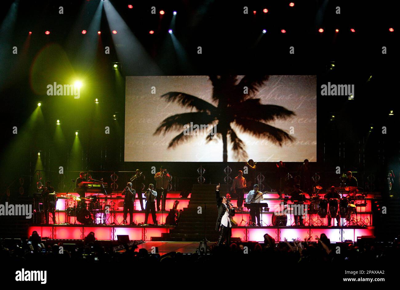 Marc Anthony performs while on a concert tour with his wife Jennifer ...