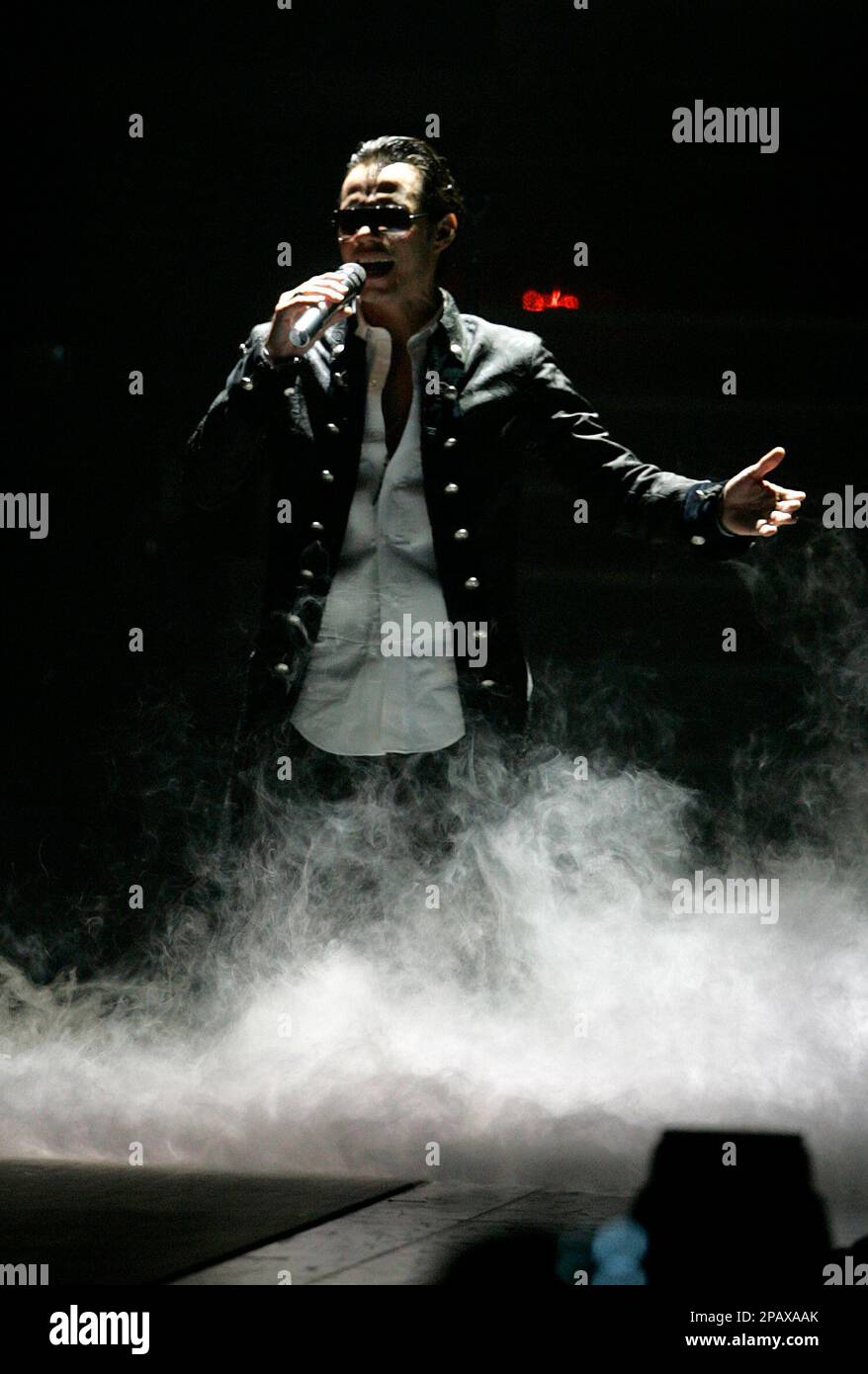 Marc Anthony performs while on a concert tour with his wife Jennifer ...