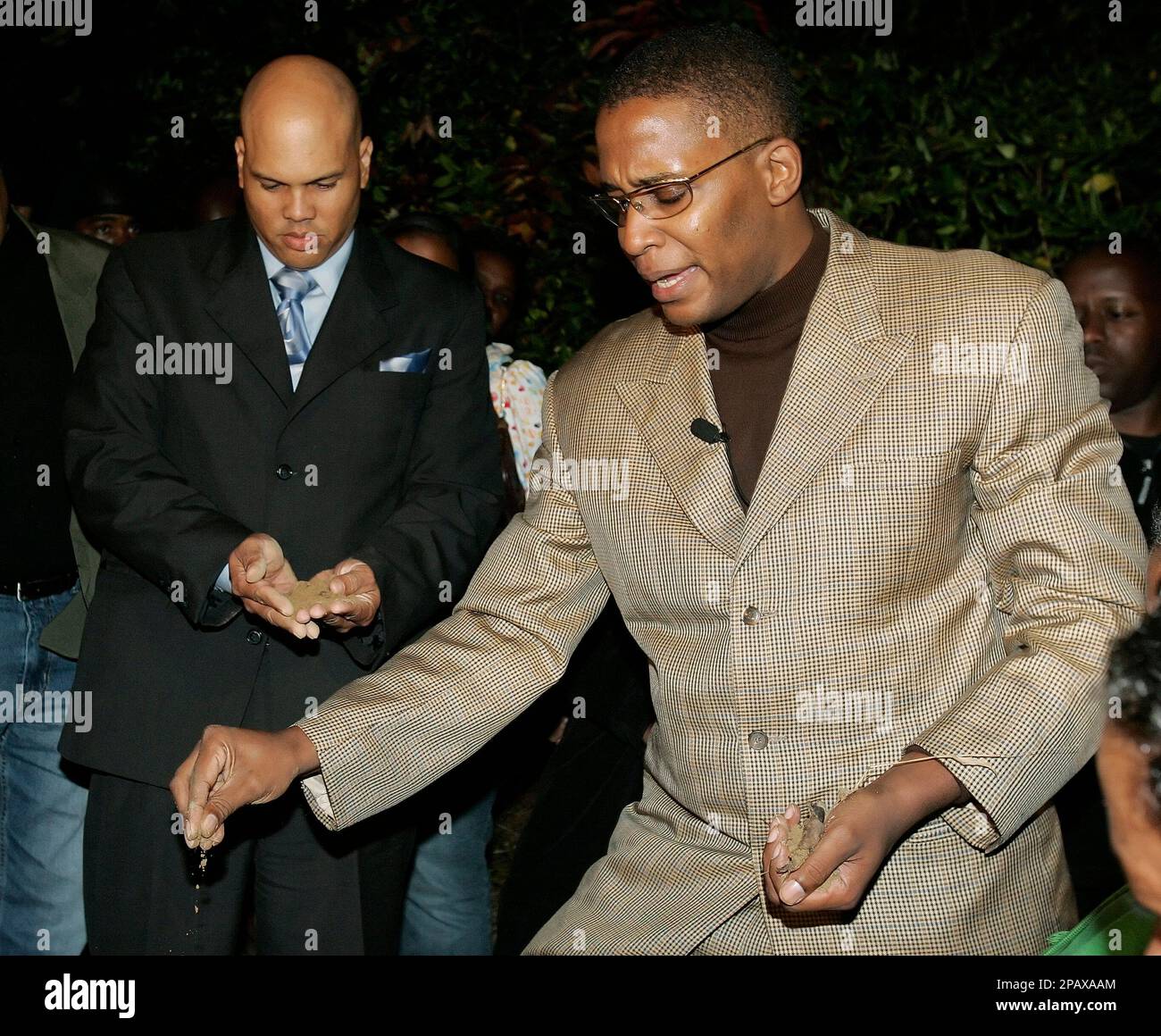 Hashim Nzinga, left, National Chief of Staff for the New Black Panther ...