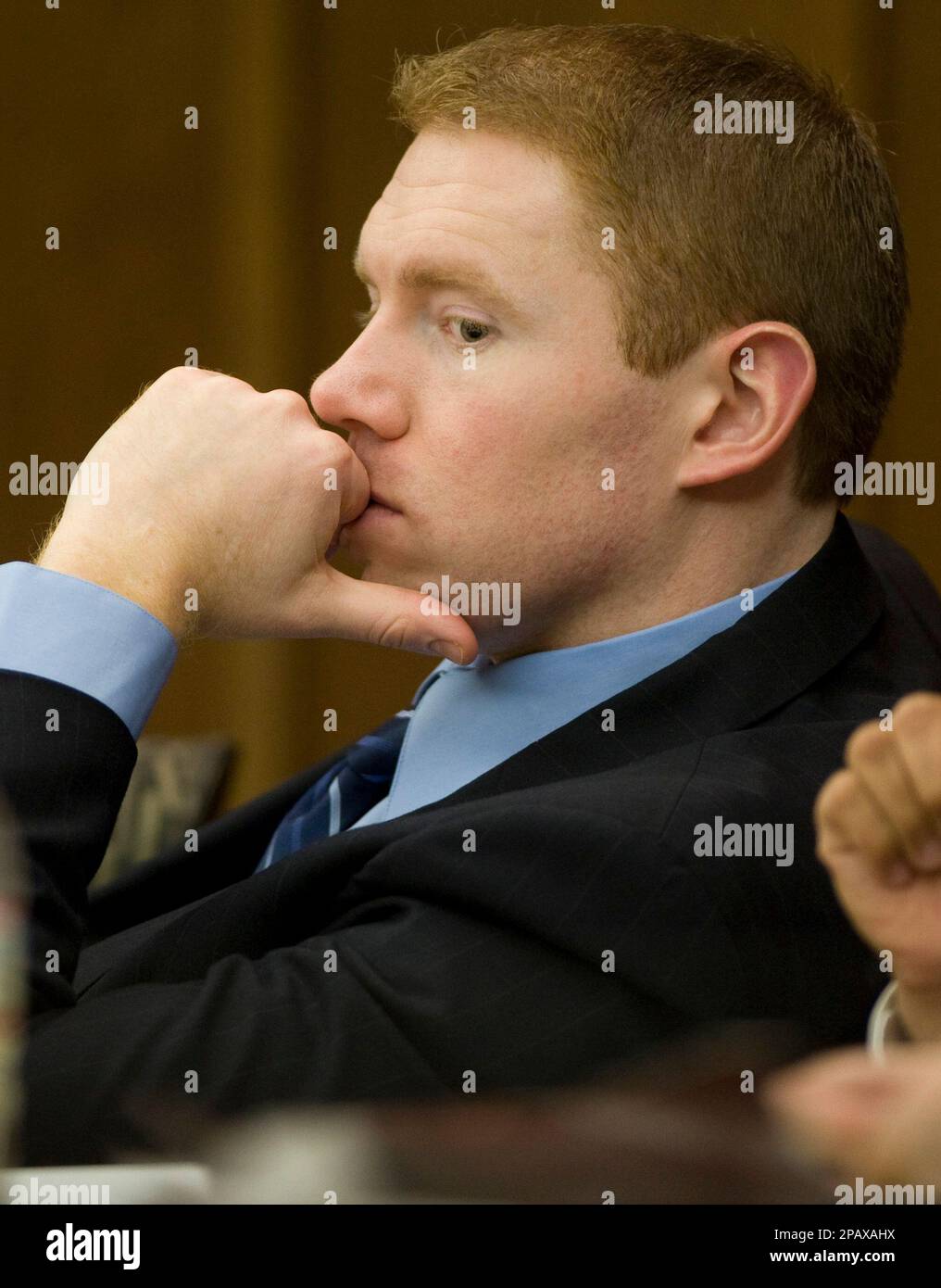 Fred Russell listens to testimony during his trial on both vehicular ...