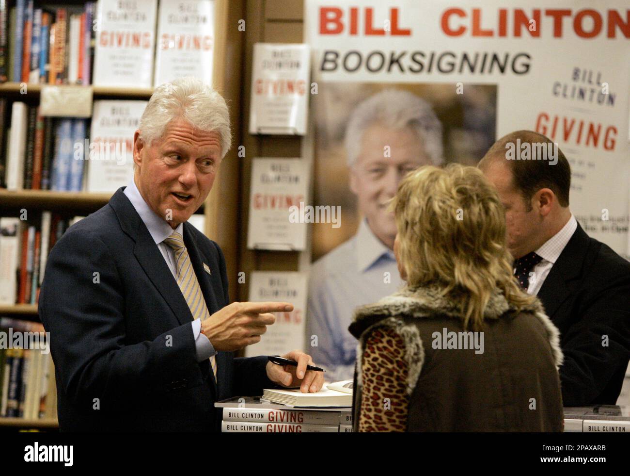 Former President Bill Clinton, left, gestures to Connie Brons of Merced ...