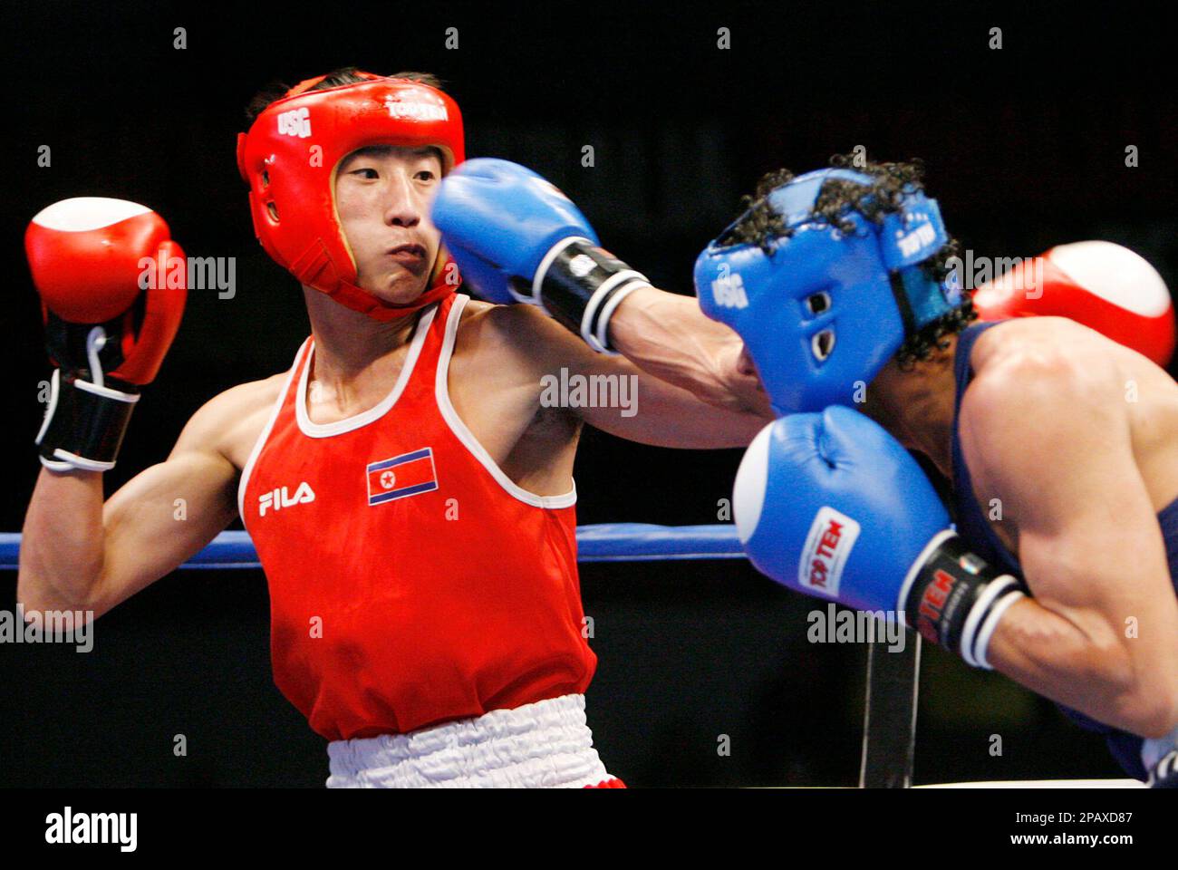 Song Guk Kim, left, of North Korea, and Darley Perez, of Colombia ...