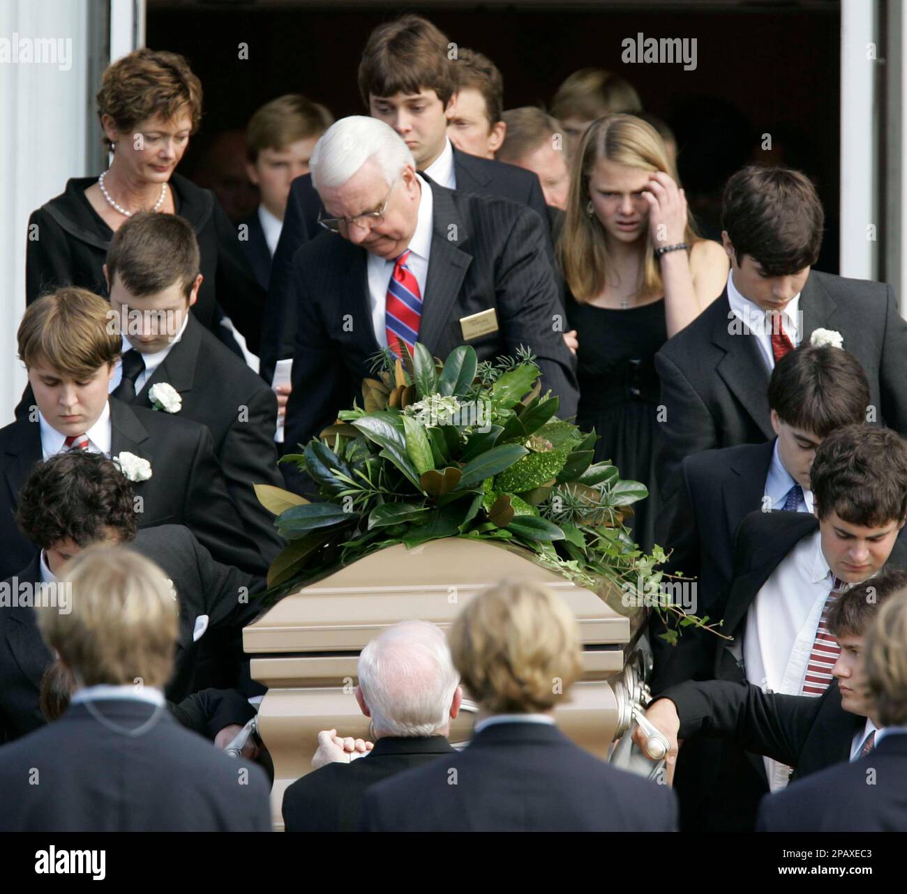 The casket of William Robert Rhea, 18, is carried out of the First ...