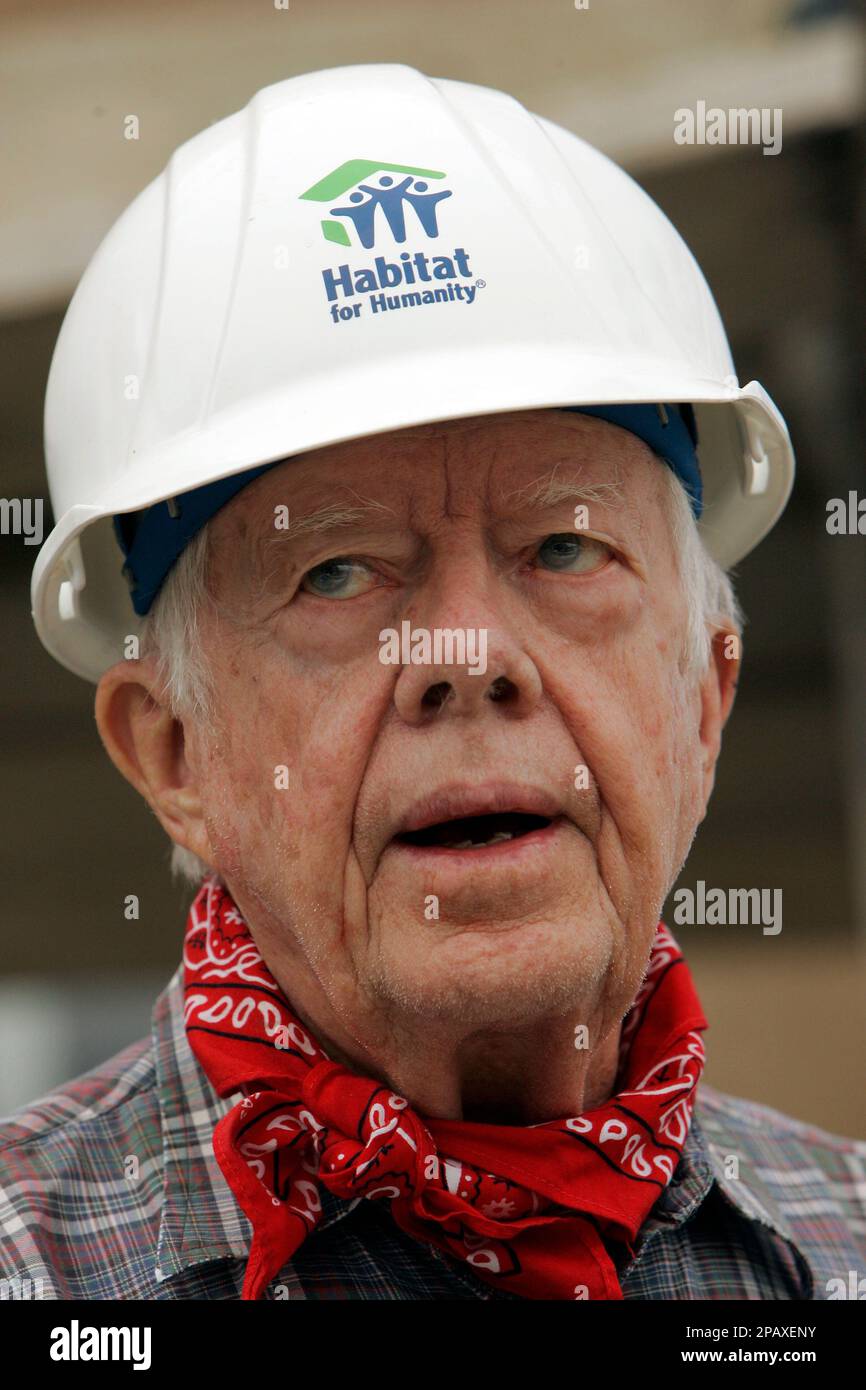 Former president Jimmy Carter works on building a house Thursday, Nov ...