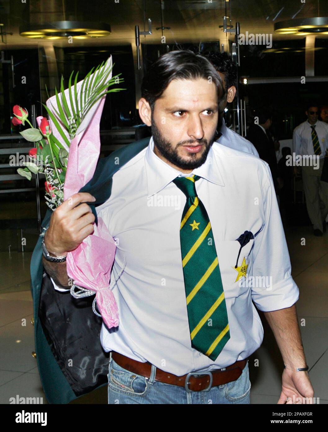 Pakistani cricket player Shahid Afridi arrives at a hotel in New Delhi ...