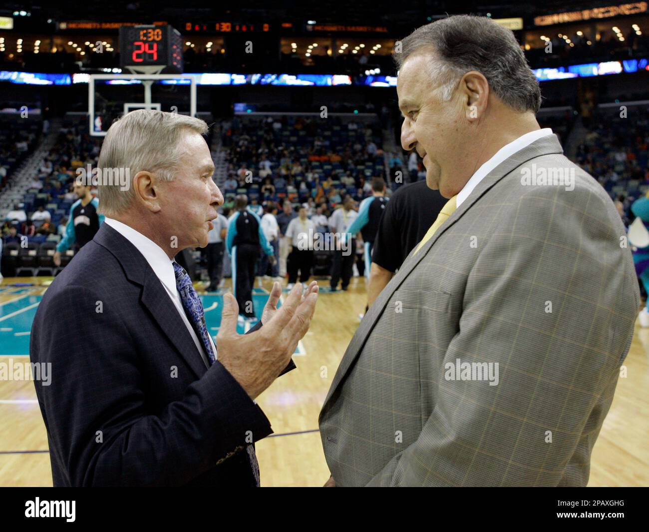 New Orleans Hornets majority owner George Shinn left and minority owner ...